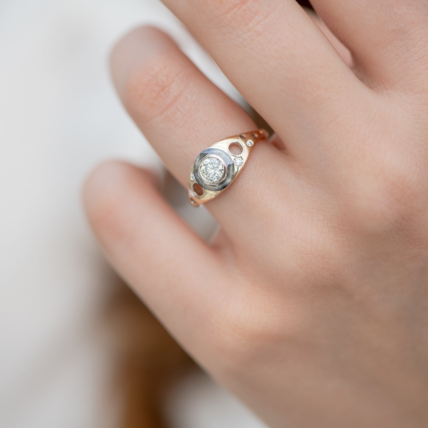 Golden Grommet Ring with a Fancy Green Diamond and Grey Diamond Sphere ...